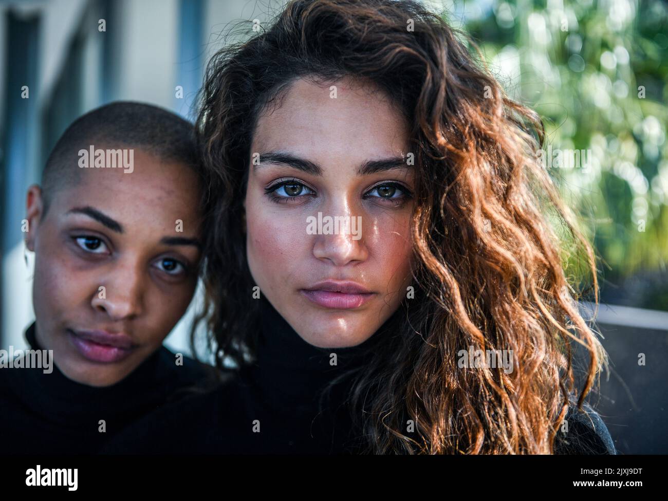Models Evelyn Yanez (right) and Lucy Blay poses for a photograph at the ...