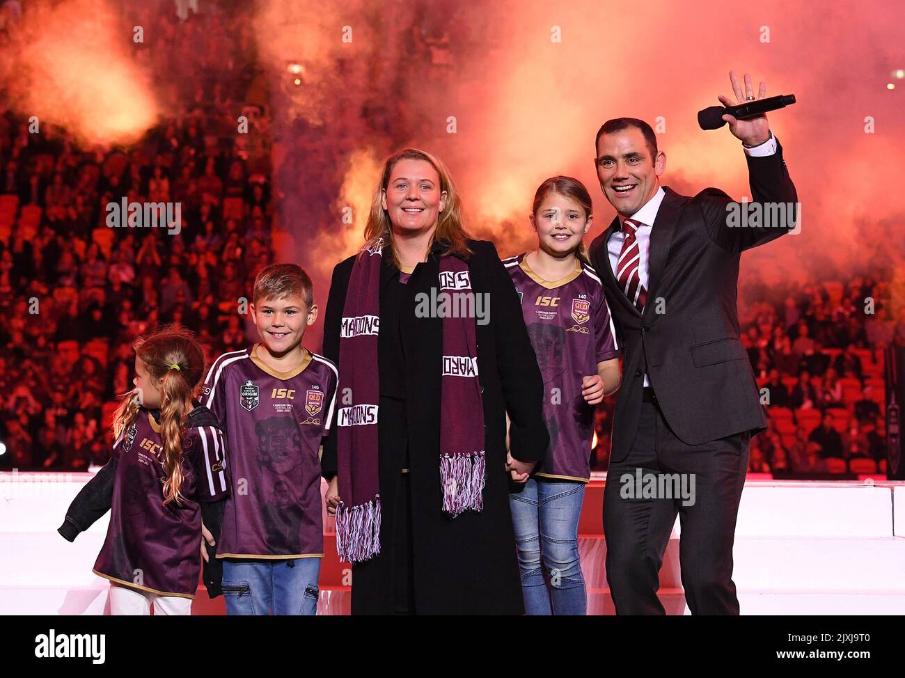 Former Queensland Maroons captain Cameron Smith (right) stands with his ...