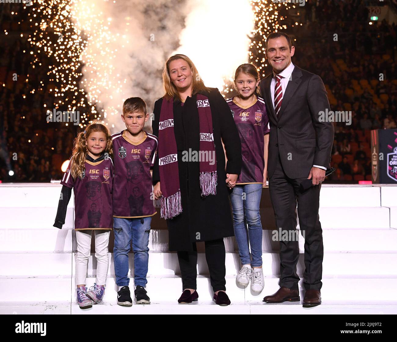 Former Queensland Maroons captain Cameron Smith (right) stands with his ...