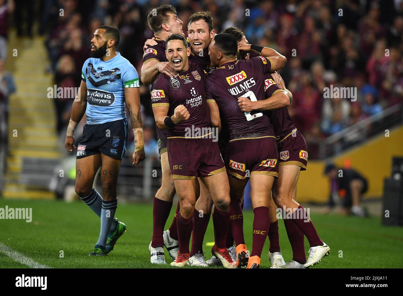 Billy Slater of the Maroons (centre) reacts after Daly Cherry-Evans ...