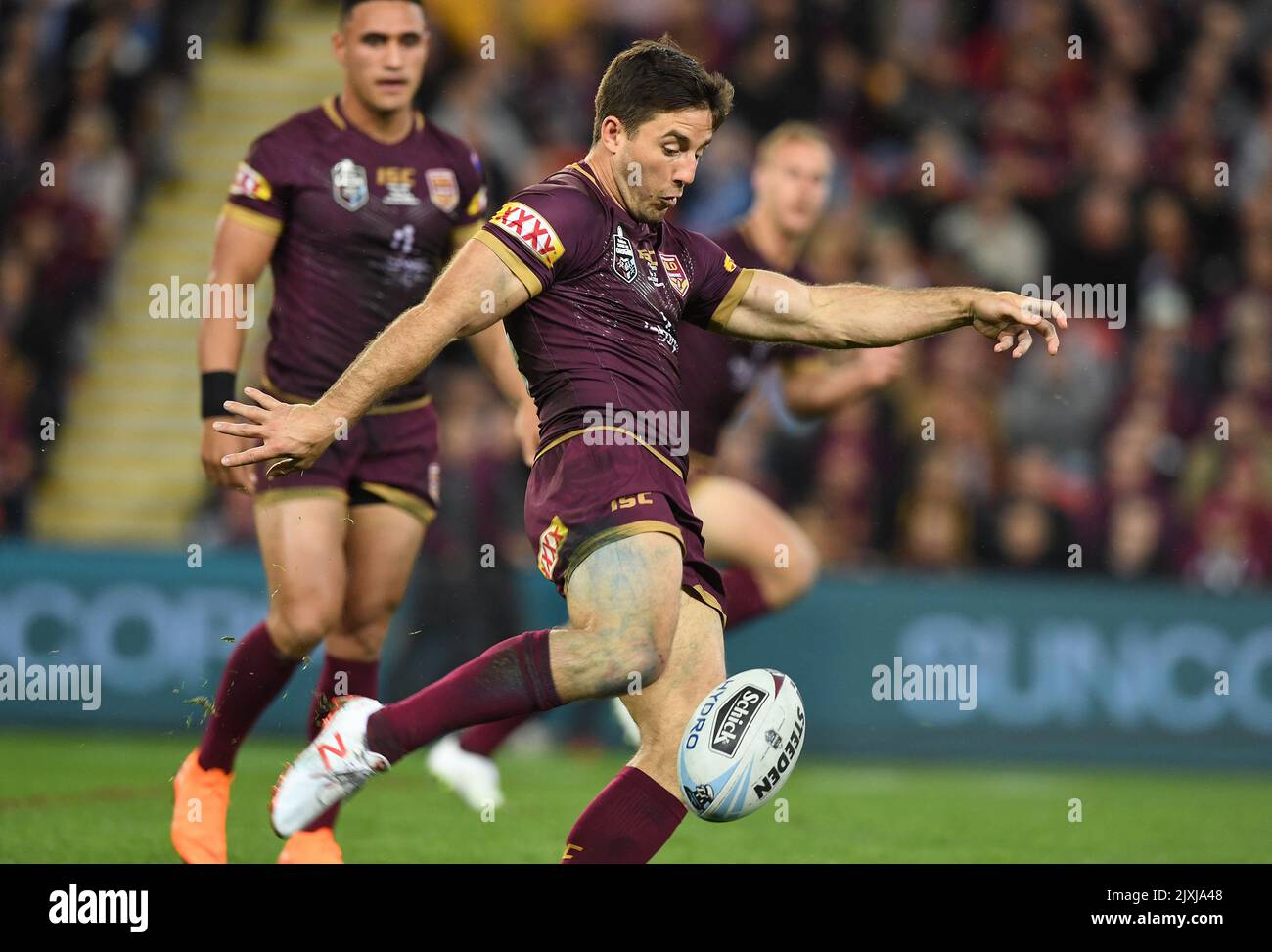 Ben Hunt of the Maroons kicks during Game 3 of the 2018 State of Origin ...