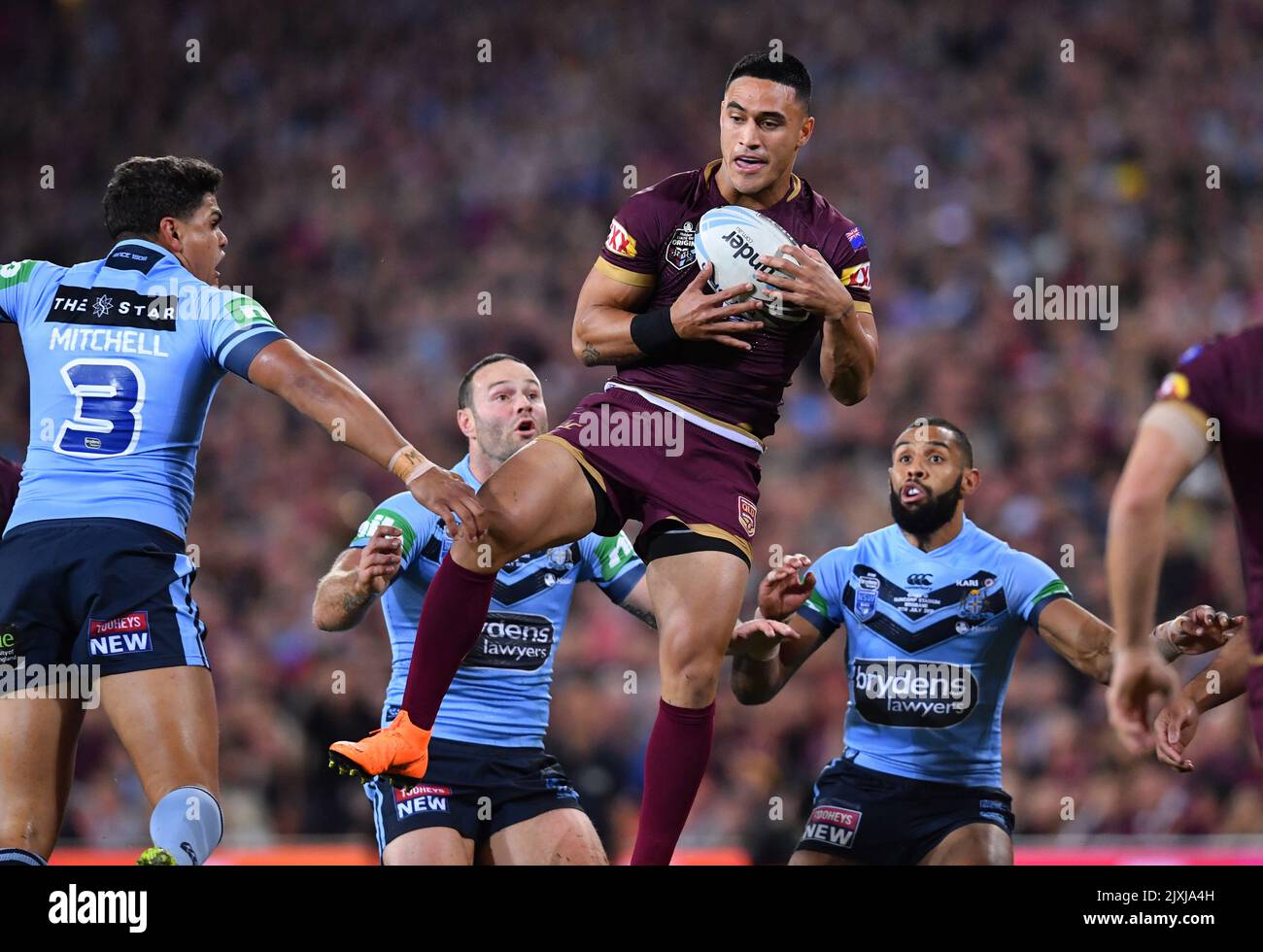 Valentine Holmes (centre) of the Maroons in action during Game 3 of the ...