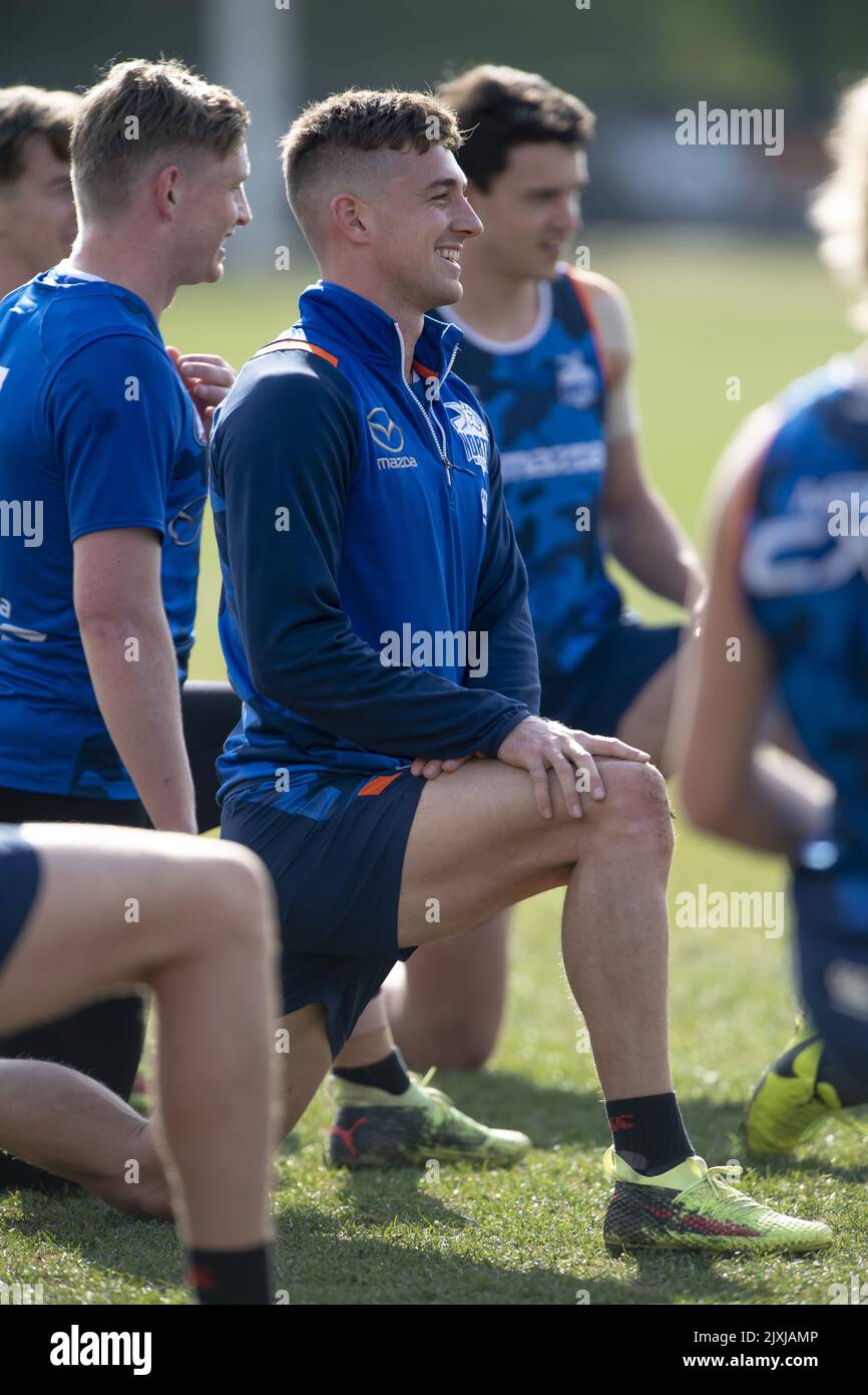 North Melbourne Kangaroos player Shaun Atley stretches during a team ...