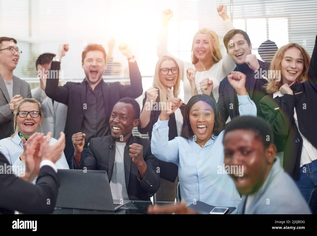 big happy business team showing their success Stock Photo - Alamy