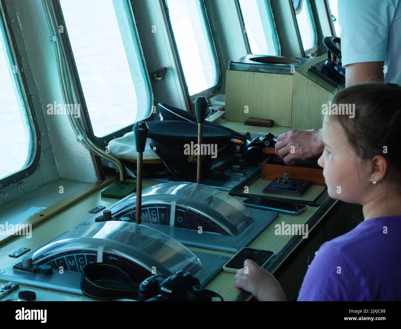 Russia, Sochi 12.06.2022. Cabin of the captain of the ship. Girl ...