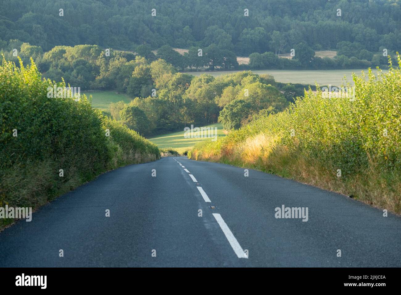 A beautiful rural country road in Gloucestershire, England- UK Stock ...