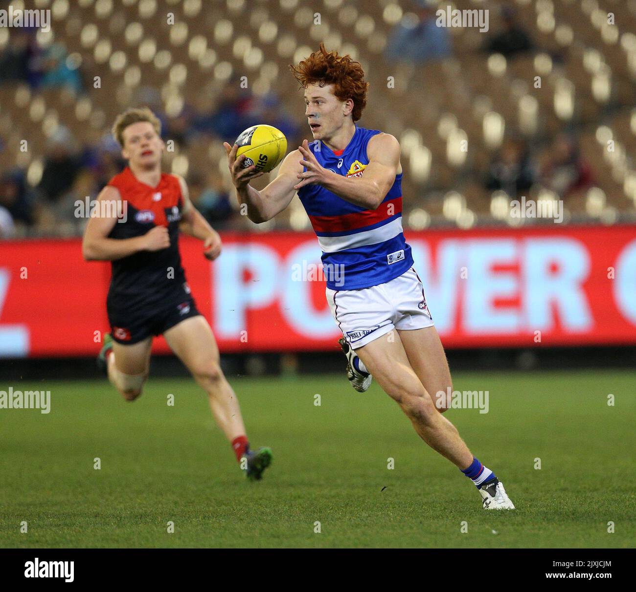 Ed Richards of the Bulldogs runs off half back during the Round 17 AFL ...