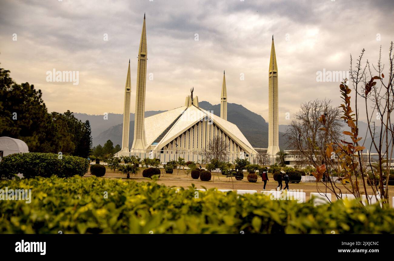 Faisal Mosque in Islamabad, Pakistan. It is located on the foothills of ...