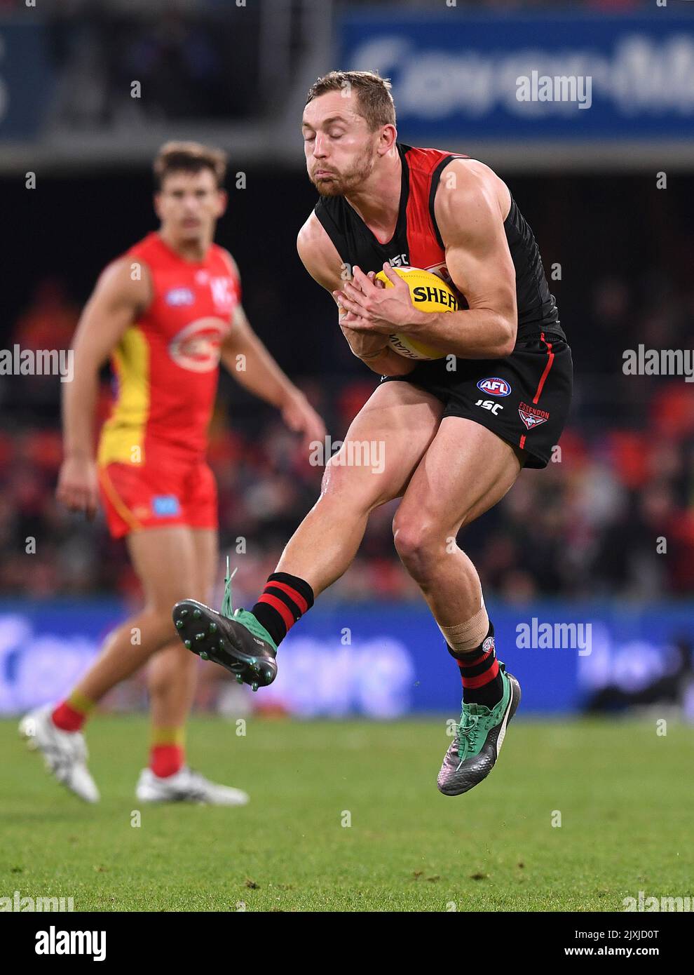 Devon Smith of the Bombers takes a mark during the Round 17 AFL match ...