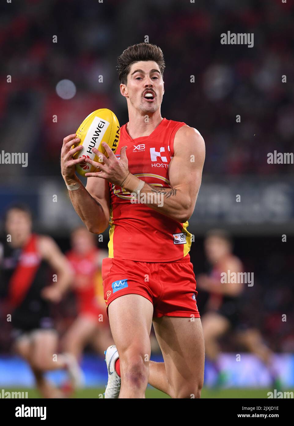 Alex Sexton of the Suns takes a mark during the Round 17 AFL match between the Gold Coast Suns ...