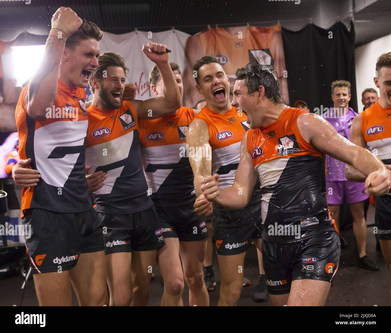 Brent Daniels of the Giants celebrates with team in the rooms after the ...