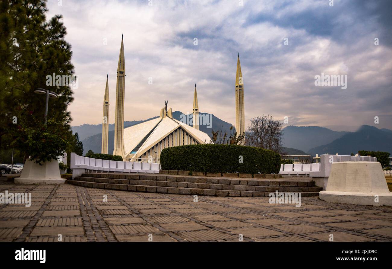 Faisal Mosque in Islamabad, Pakistan. It is located on the foothills of ...