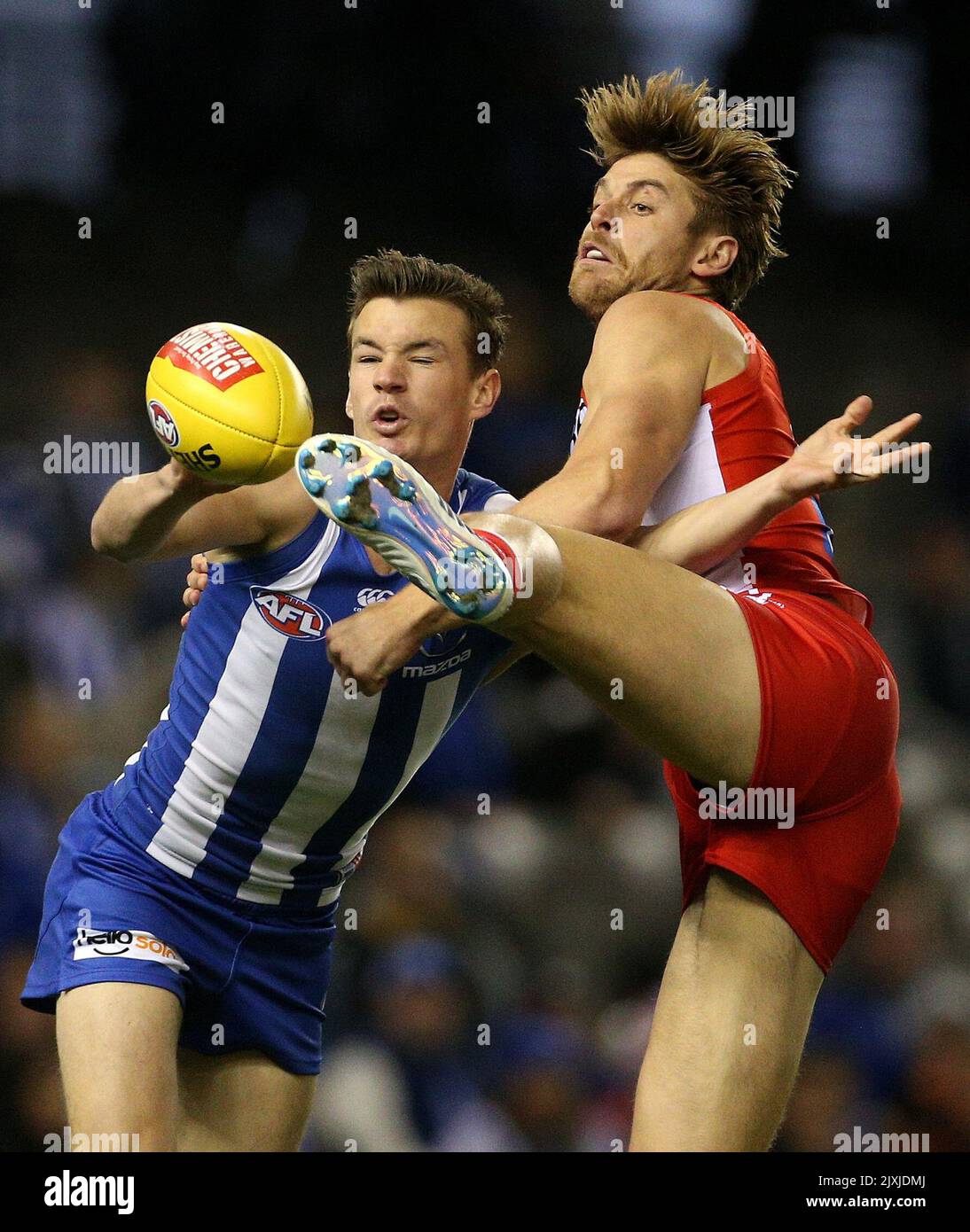 Kayne Turner of the Kangaroos (left) contests with Dane Rampe of the ...