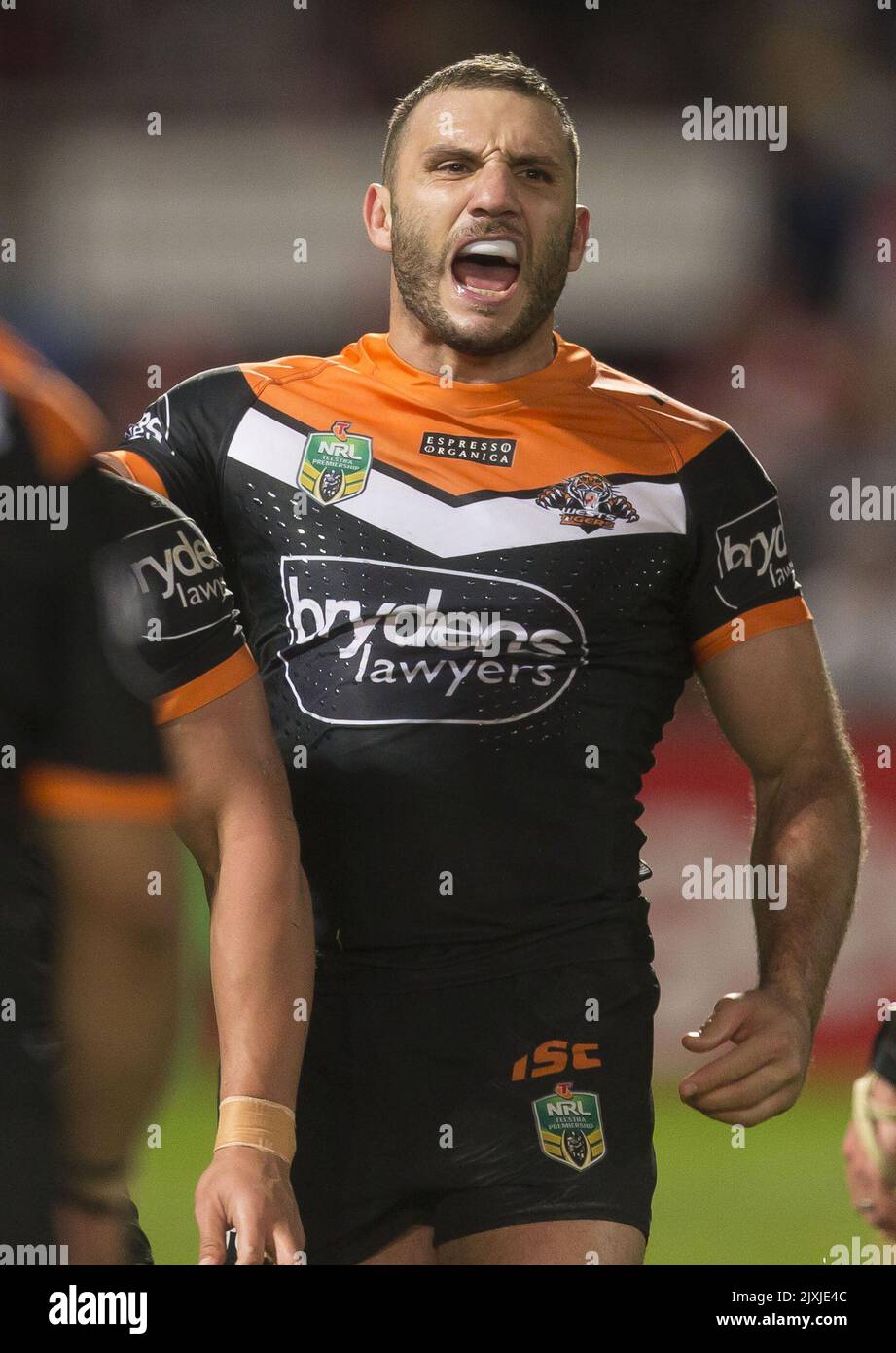 Robbie Farah of the Tigers celebrates at full time during the Round 18 ...
