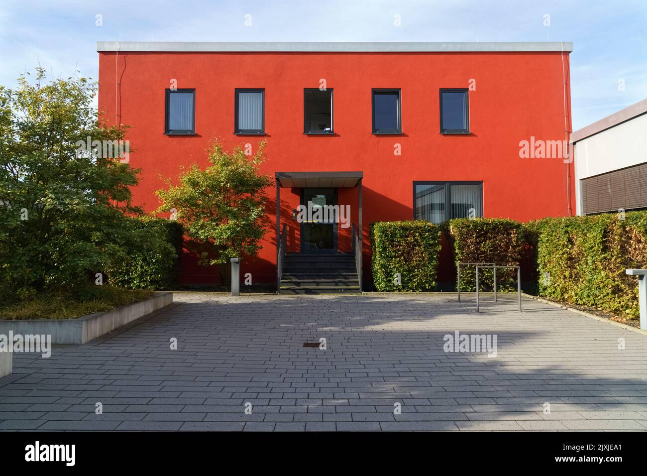 Red-brown modern facade with windows. A new elite commercial complex ...