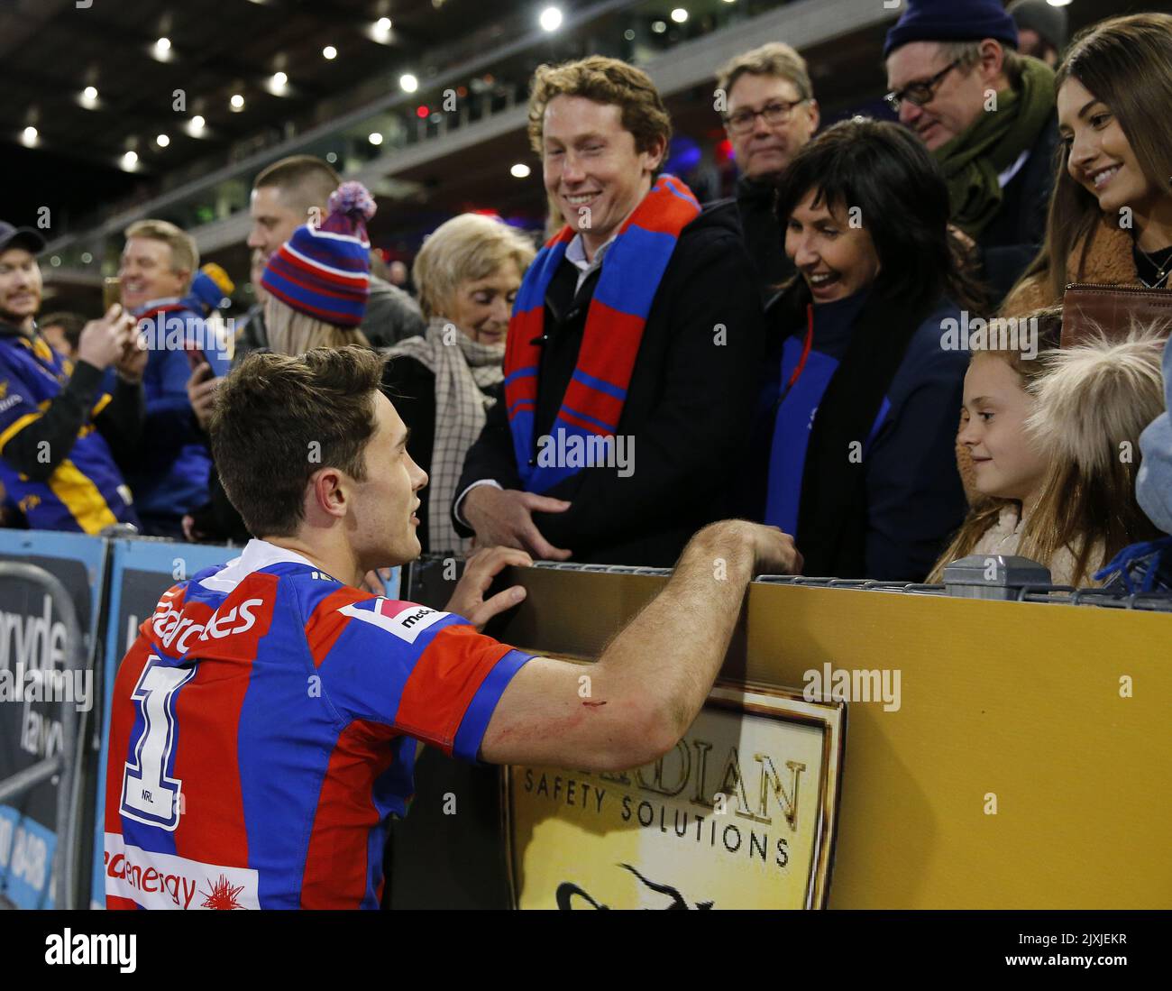 Nicholas Meaney of the Knights chats with family following his NRL ...