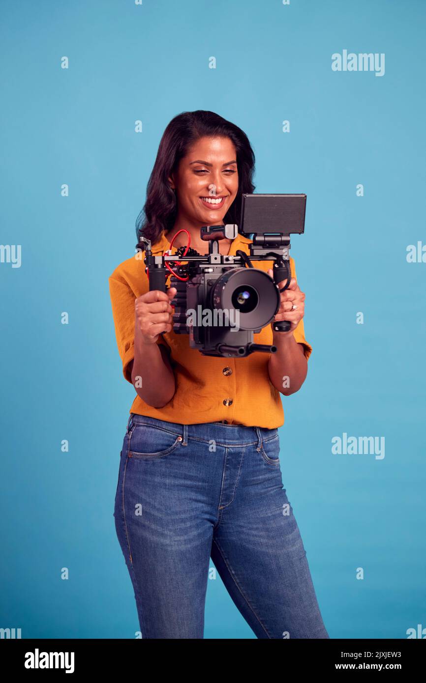 Vertical video woman in blue hi-res stock photography and images - Alamy