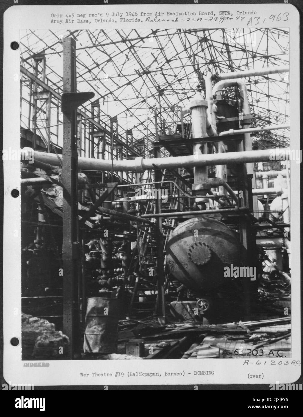Interior view of a steam plant in Balikpapan area, showing destruction ...