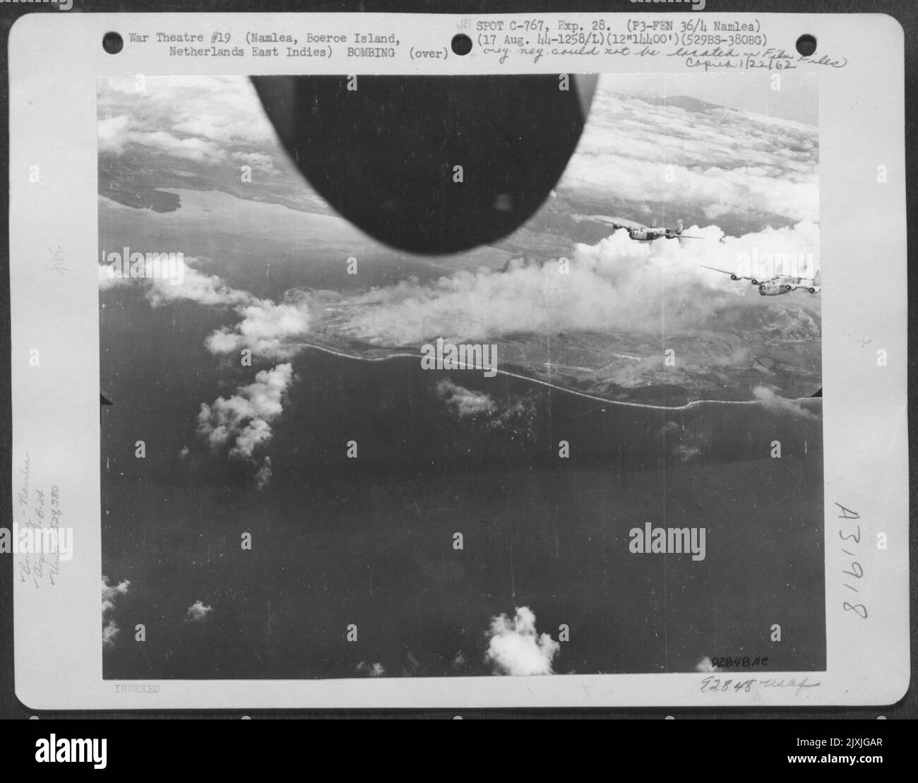 Bombs burst at Namlea, Boeroe Island, Netherlands East Indies on August ...