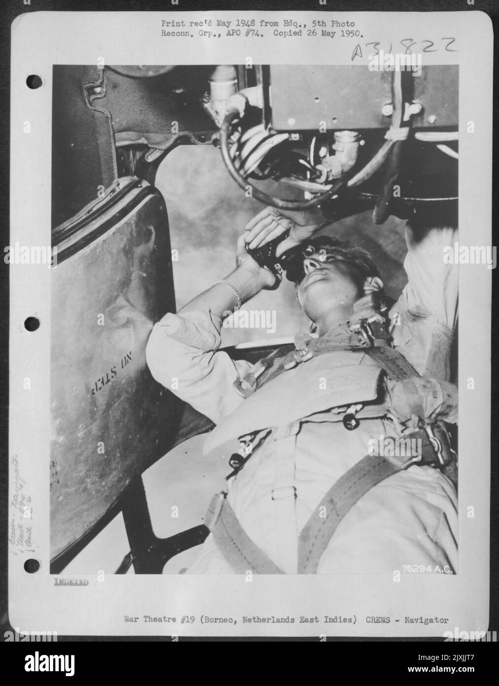 A navigator of the 394th Bomb Squadron, 5th Bomb Group "Bomber Barons ...