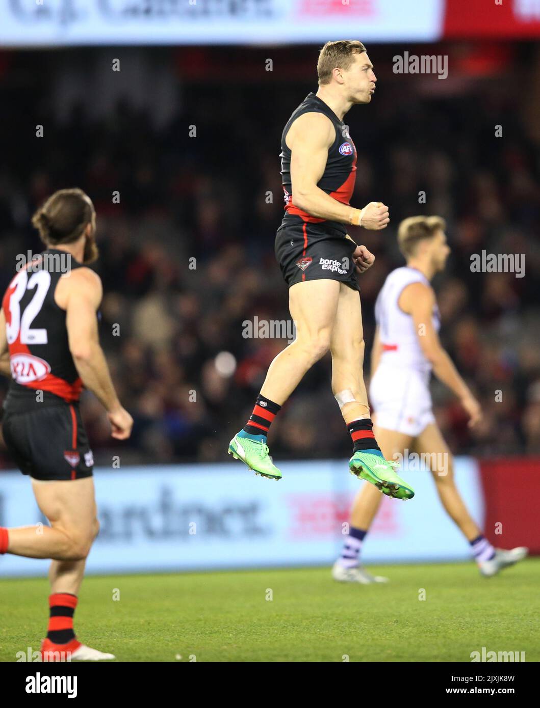 Devon Smith celebrates after kicking a goal for the Bombers during the ...