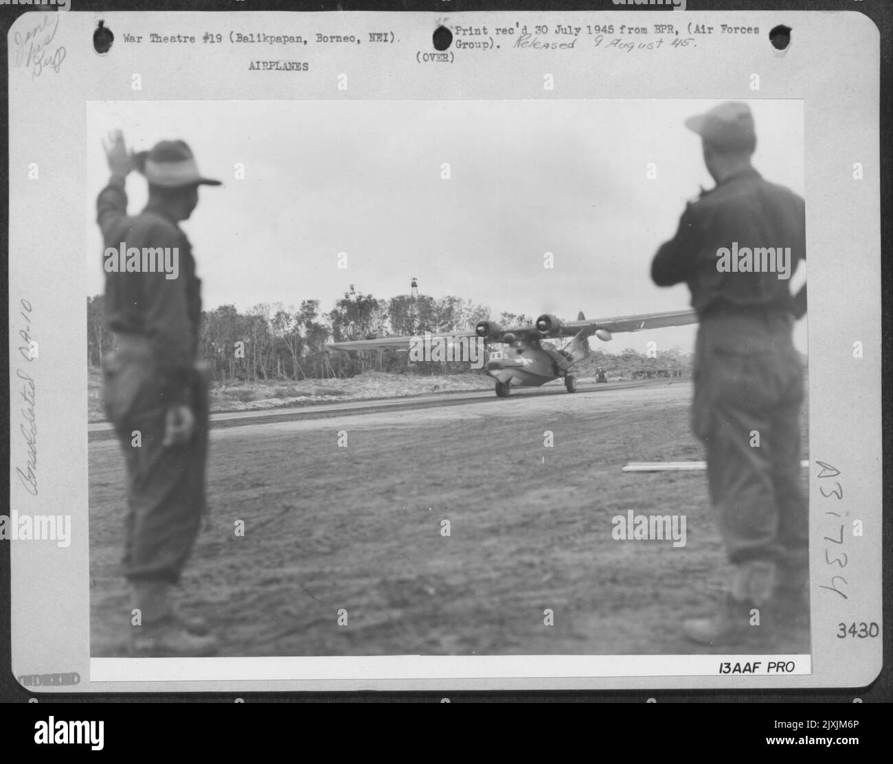 The first plane to land at Seppingen airdrome, Balikpapan, Borneo ...