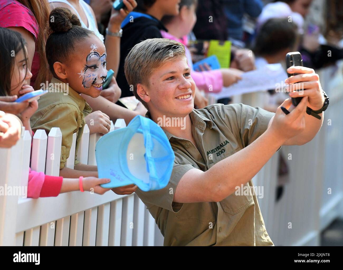 Robert Irwin takes selfies with fans during an event to celebrate his ...