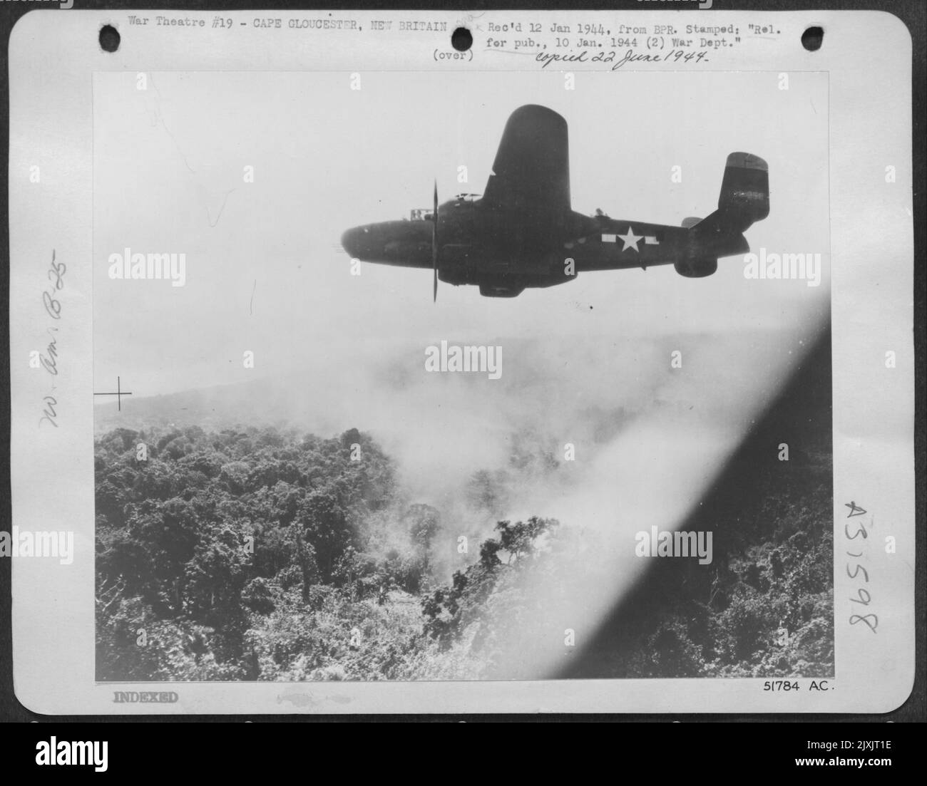 One of the General Kenney's B-25's (Billy Mitchell) bombers in action ...