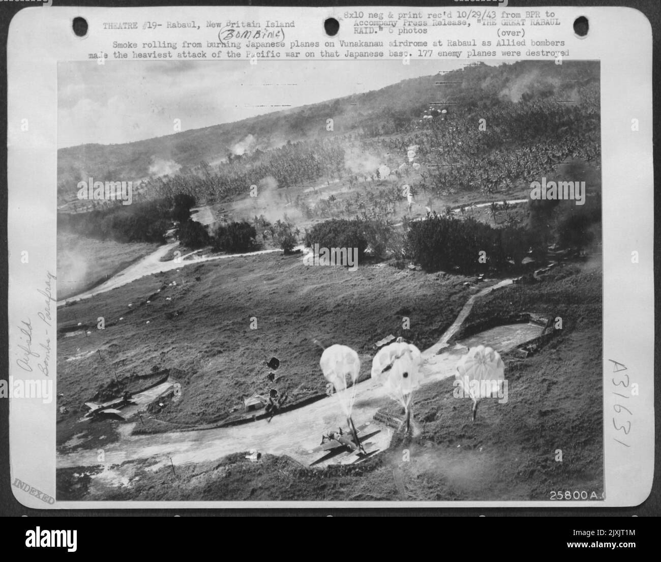 Smoke rolling from burning Japaneseanese planes on Vunakanau airdrome ...