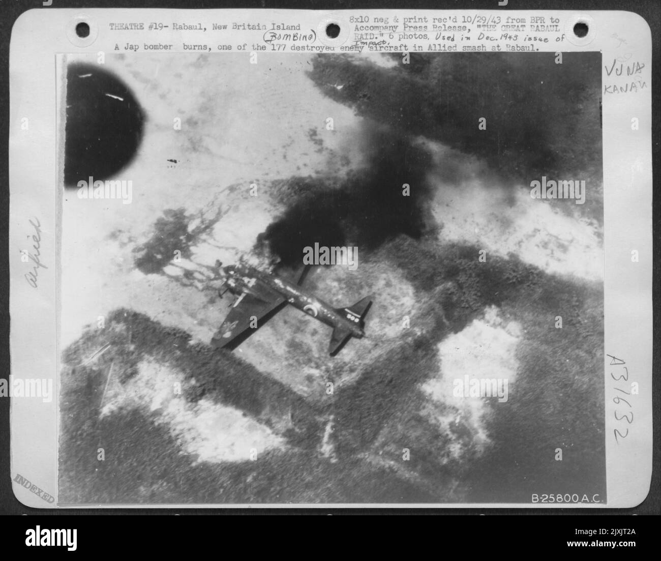A Japanese bomber burns, one of the 177 destroyed enemy impact aircraft ...