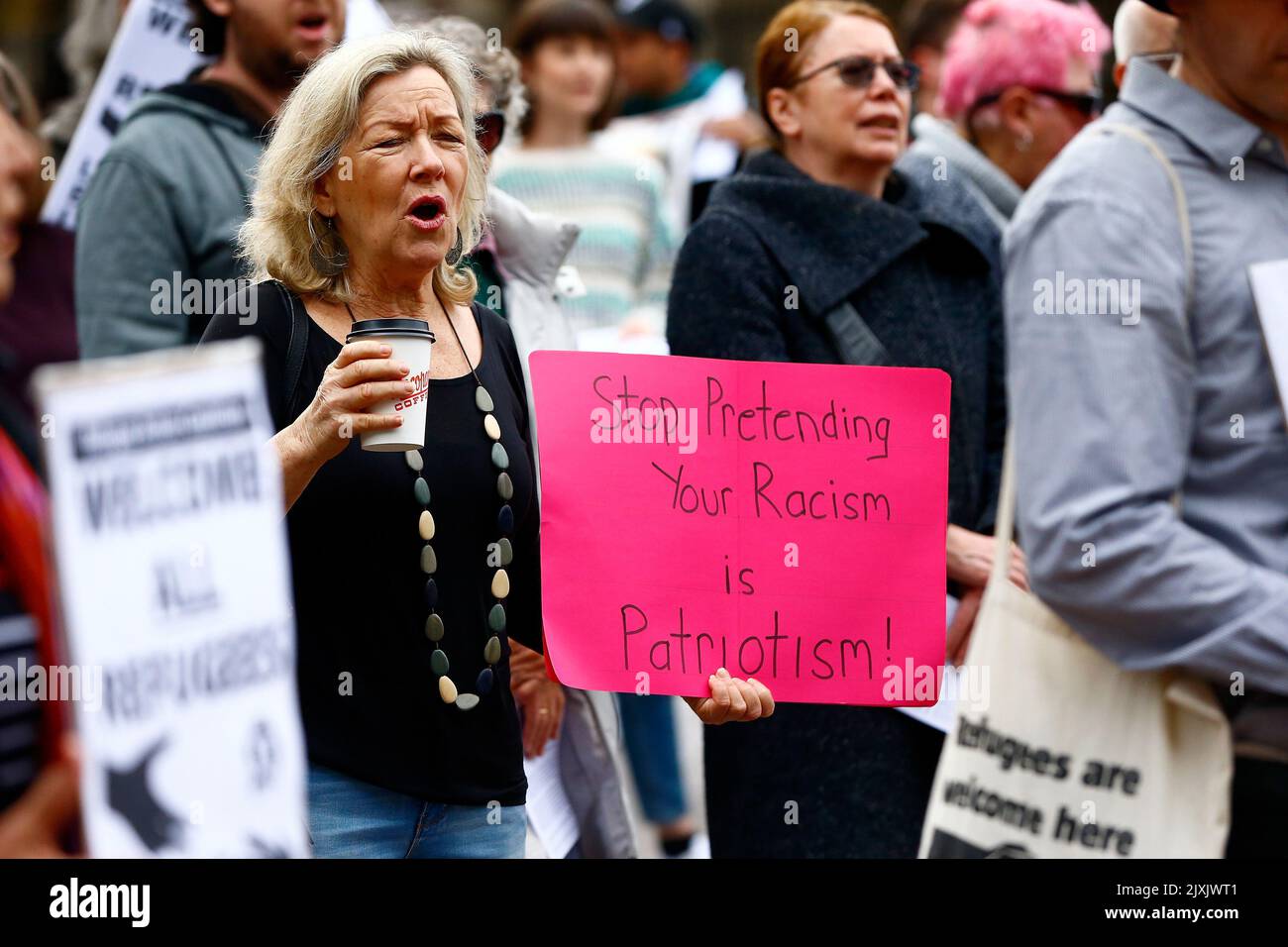 Protesters are seen during the 'No to Dutton's White Australia Racism ...