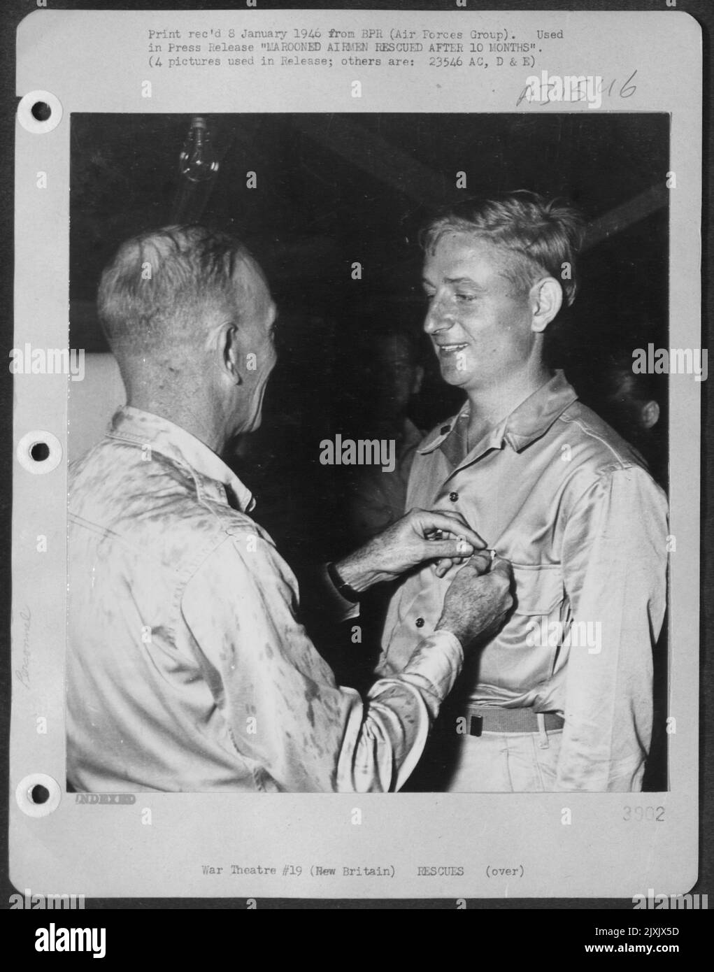 Lt. Marvin C. Hughes receives the Purple Heart from Brig. Gen. Ennis C ...