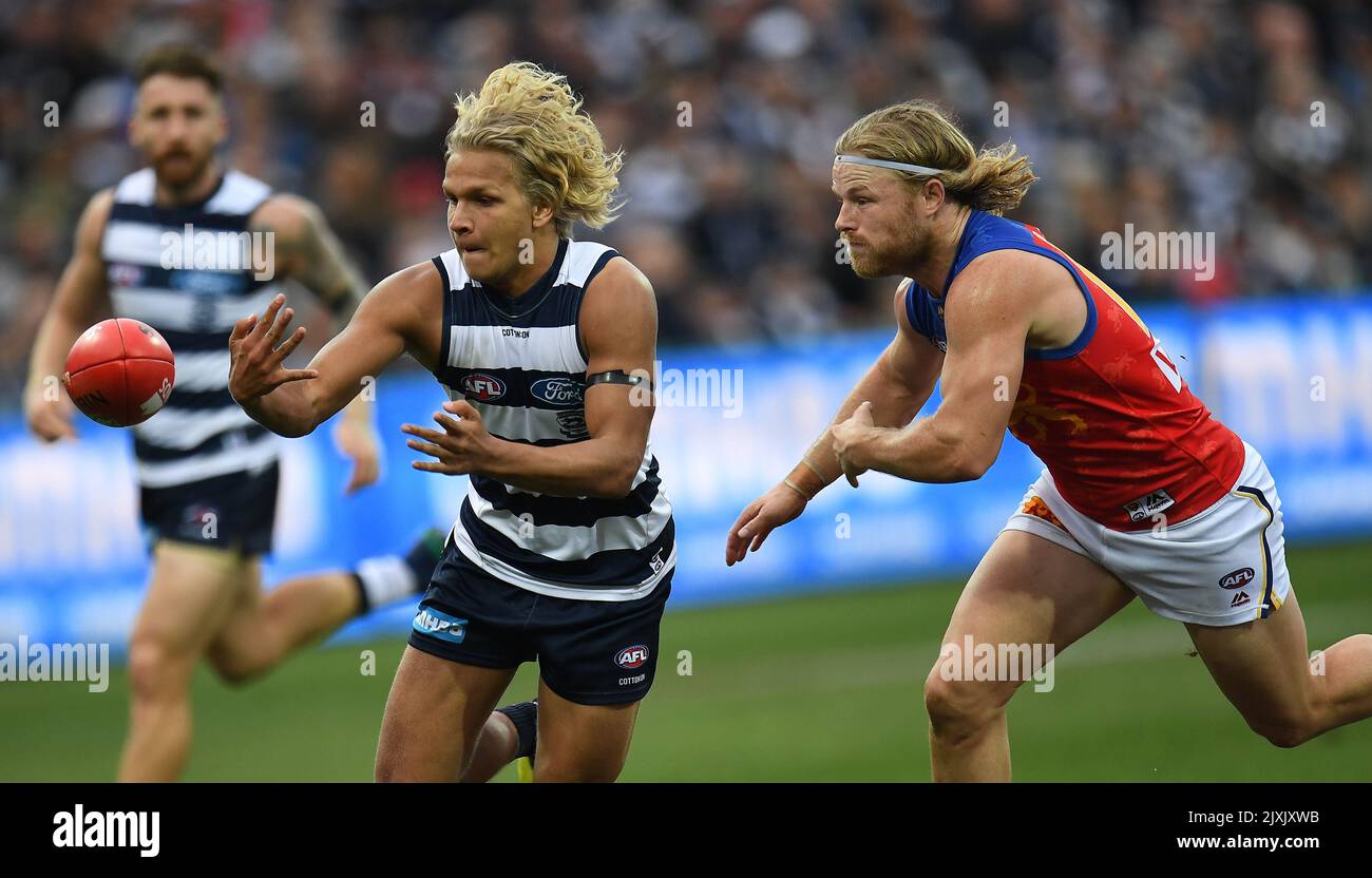 Quinton Narkle of the Cats (left) and Daniel Rich of the Lions contest ...