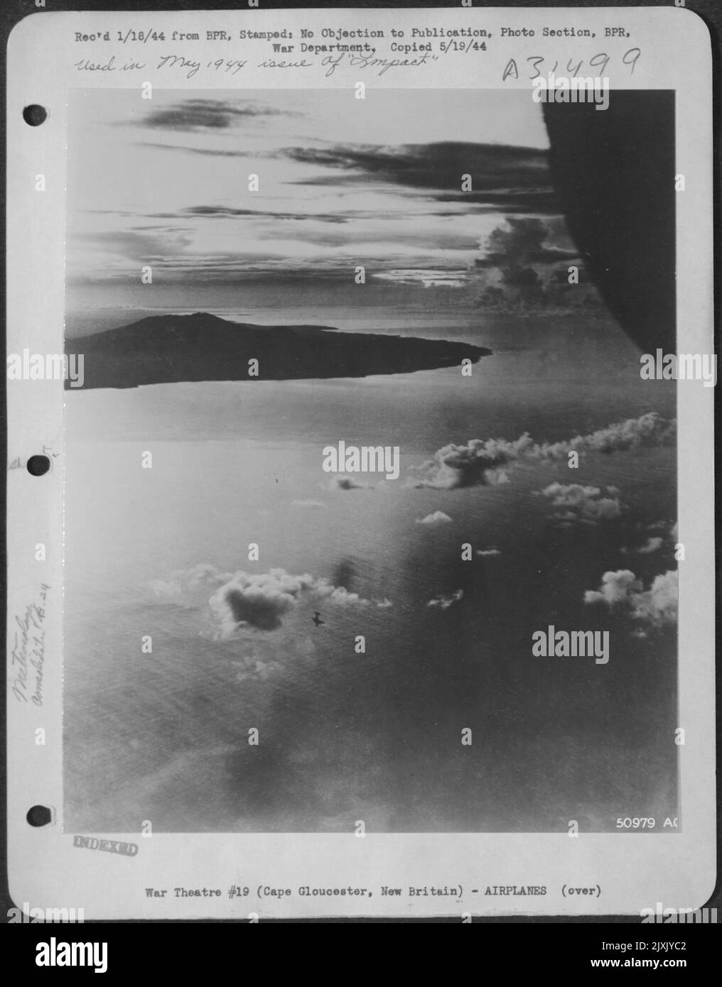 The dive of a Consolidated B-24 photographed from another B-24 in ...