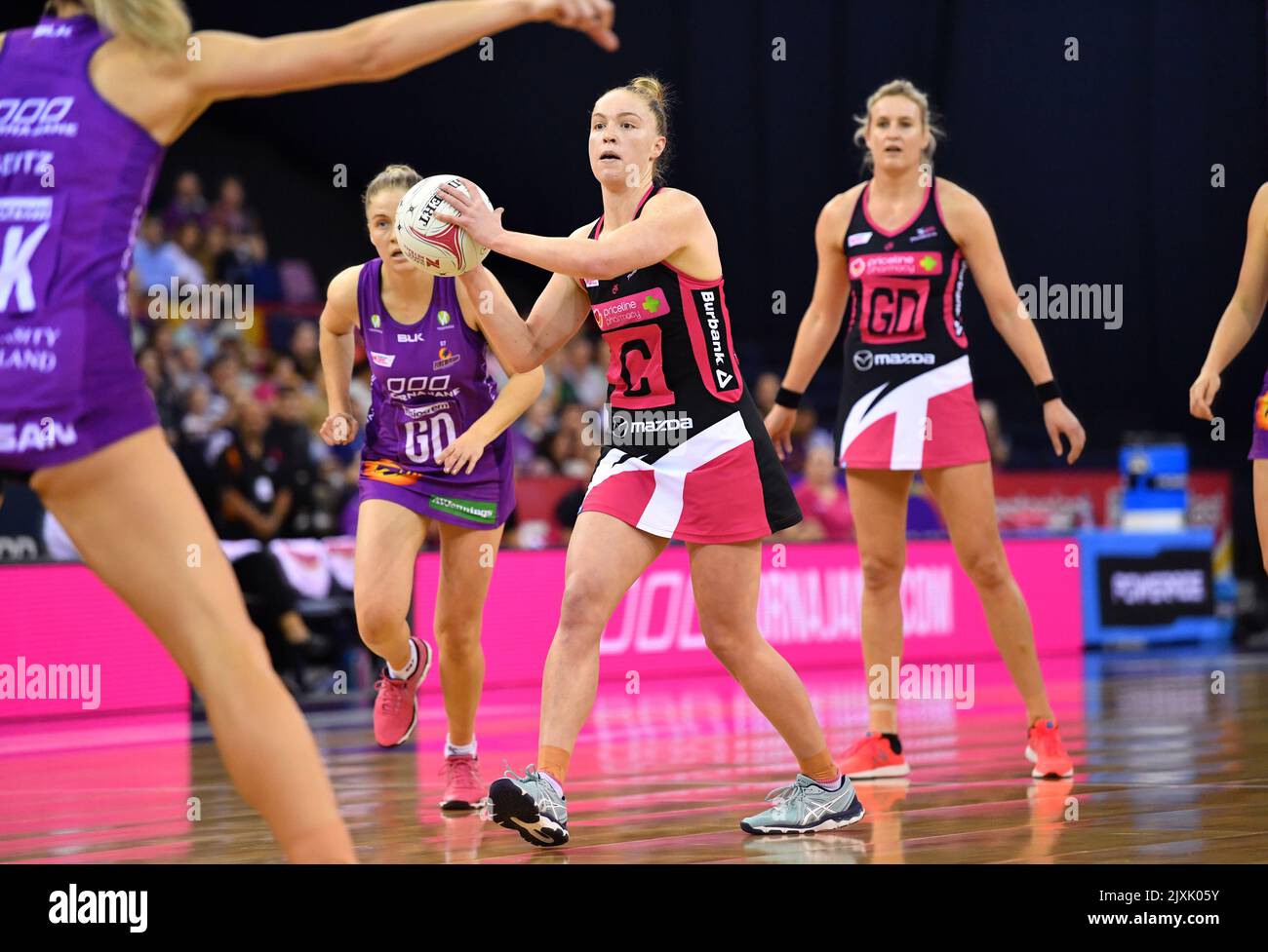 Hannah Petty (centre) of the Thunderbirds in action during the Round 13 ...