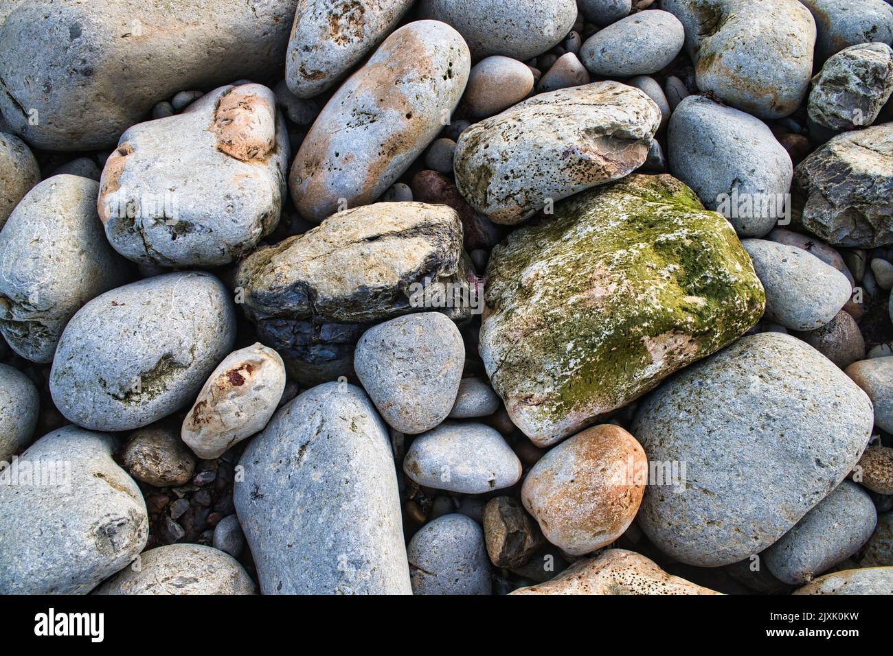 A big and small rocks covered with moss Stock Photo - Alamy