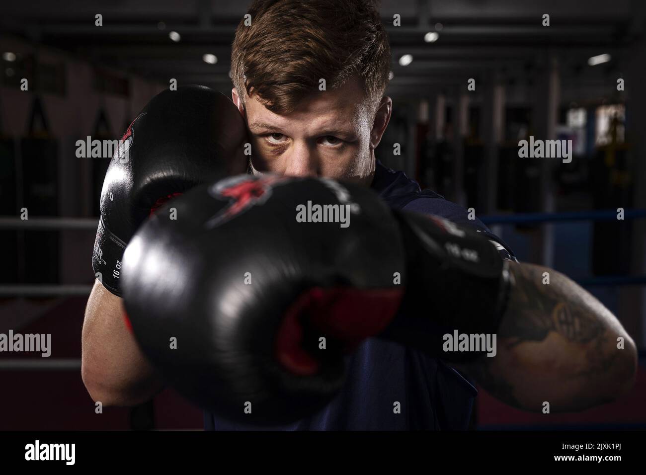 Australian UFC fighter Jim Crute poses for a photograph during a media ...