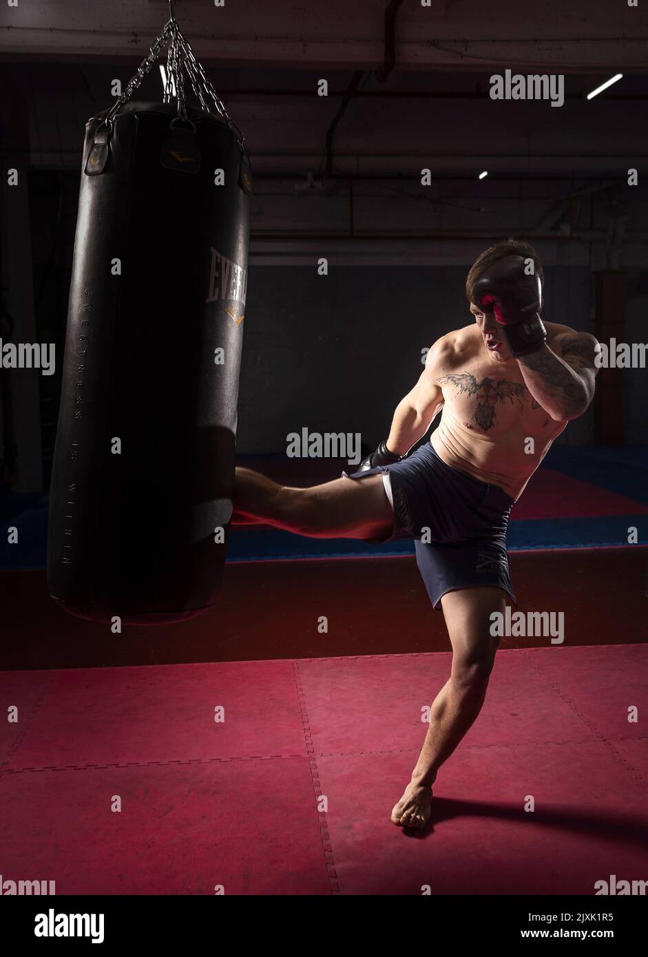 Australian UFC fighter Jim Crute poses for a photograph during a media ...