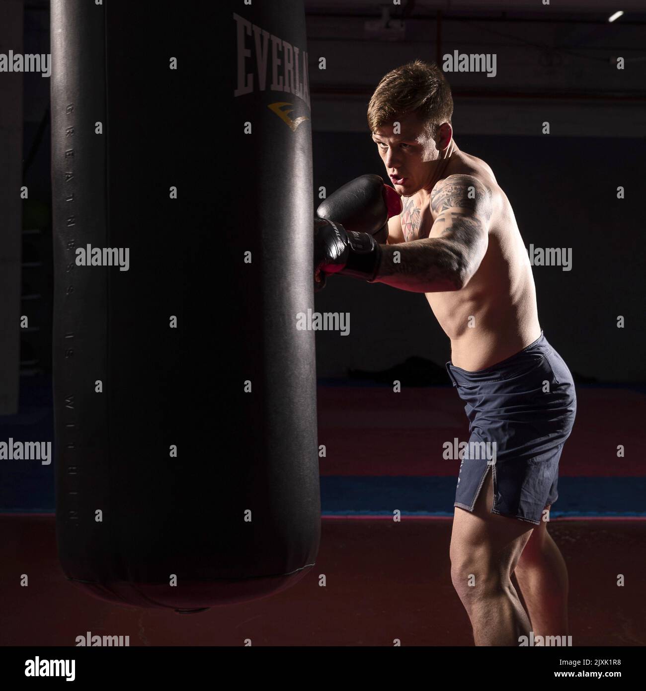 Australian UFC fighter Jim Crute poses for a photograph during a media ...