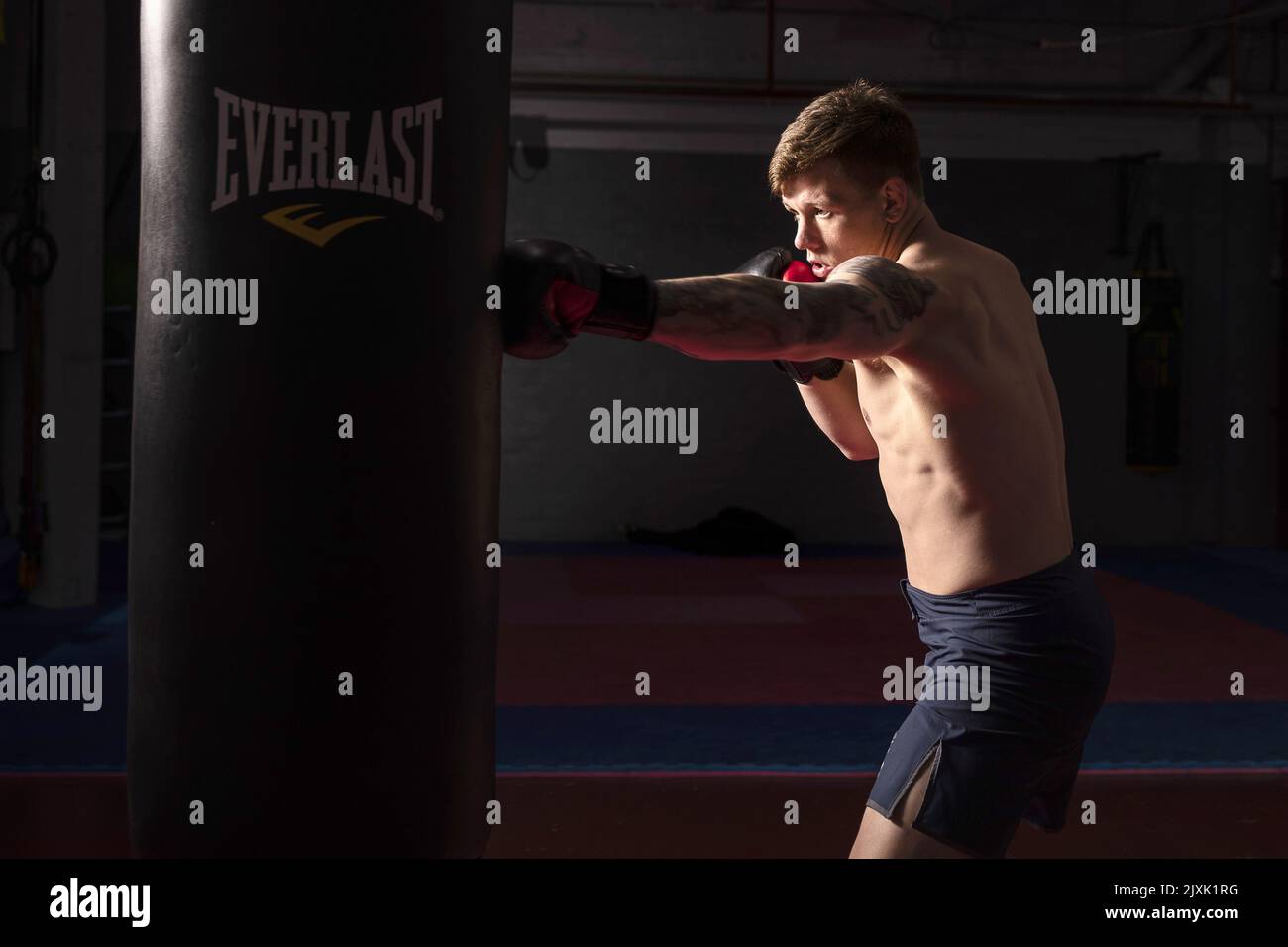 Australian UFC fighter Jim Crute poses for a photograph during a media ...