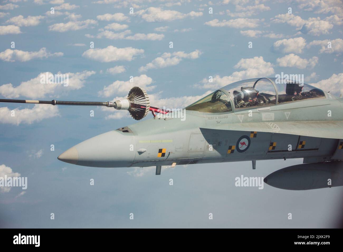 A RAAF F-18 Hornet is seen over the Northern Territory after receiving ...