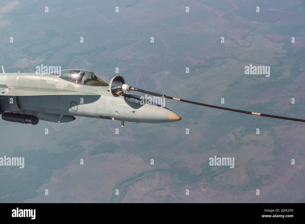 A RAAF F-18 Hornet is seen over the Northern Territory before receiving ...