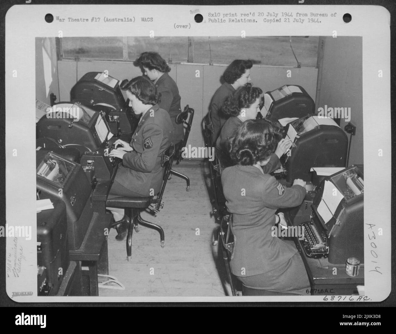 TELETYPE OPERATORS. .. .These five members of the Women's Army Corps are assigned as teletype ...