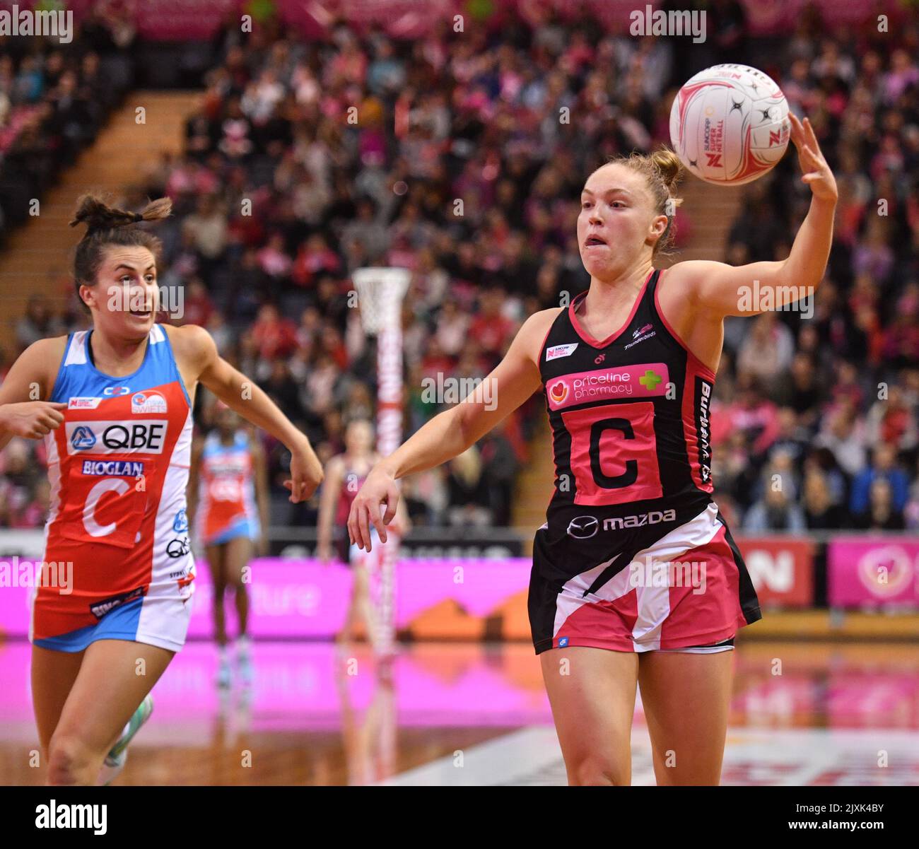 Hannah Petty of the Thunderbirds grabs the ball ahead of Maddy Proud of ...