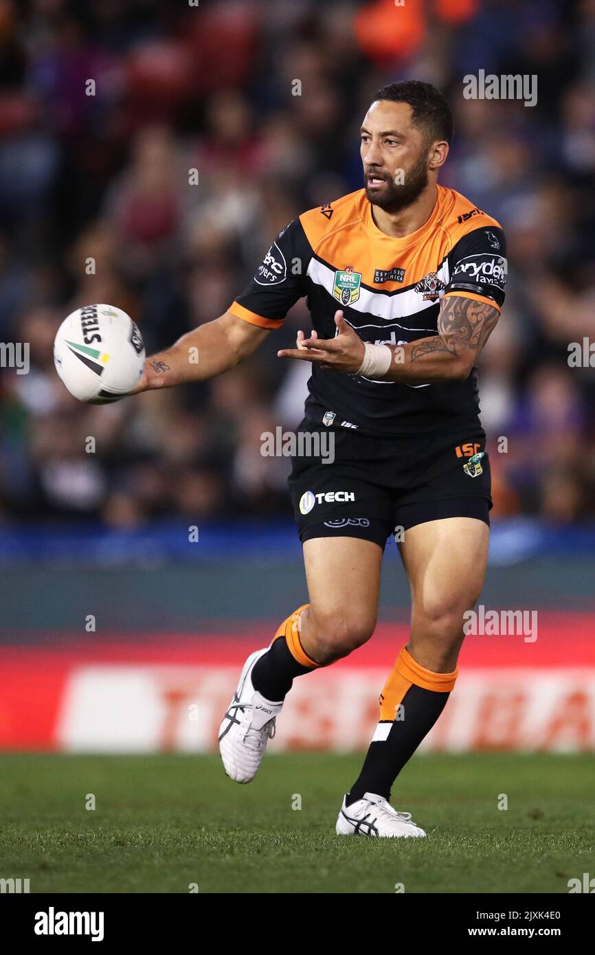 Benji Marshall of the Tigers passes the ball to a team mate during the ...