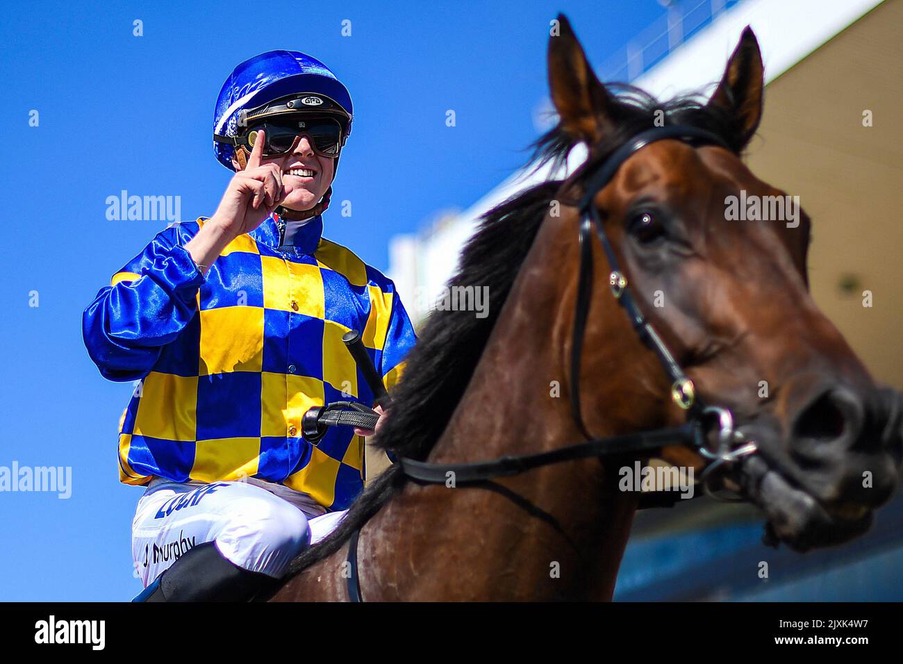 Jockey Jackson Murphy gestures after riding Tarzan to victory in race 4 ...