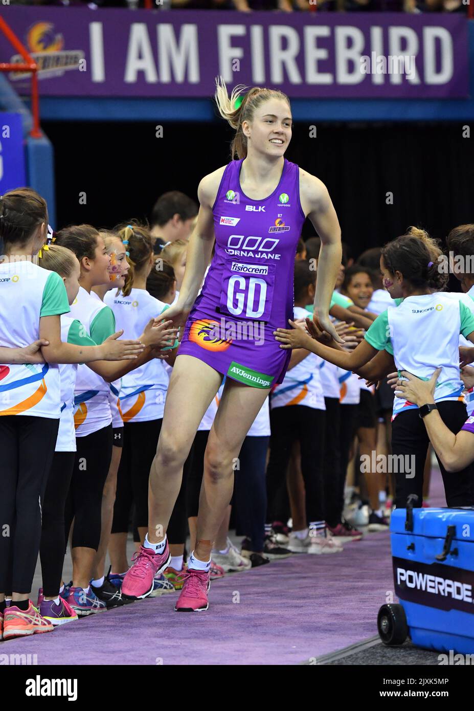 Kimberley Jenner of the Firebirds is seen running onto the court at the ...