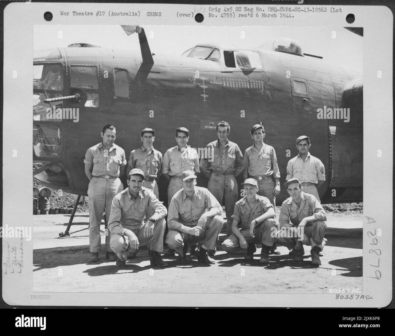 Crew members of a Consolidated B-24 of the 530th Bomb Squadron, 380th ...