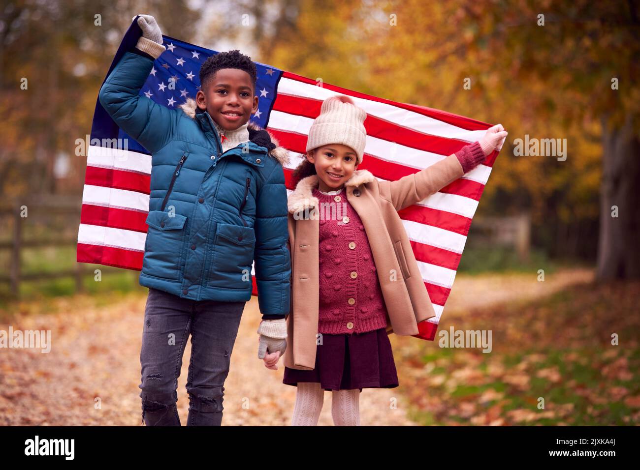 Children holding american flag in hi-res stock photography and images ...