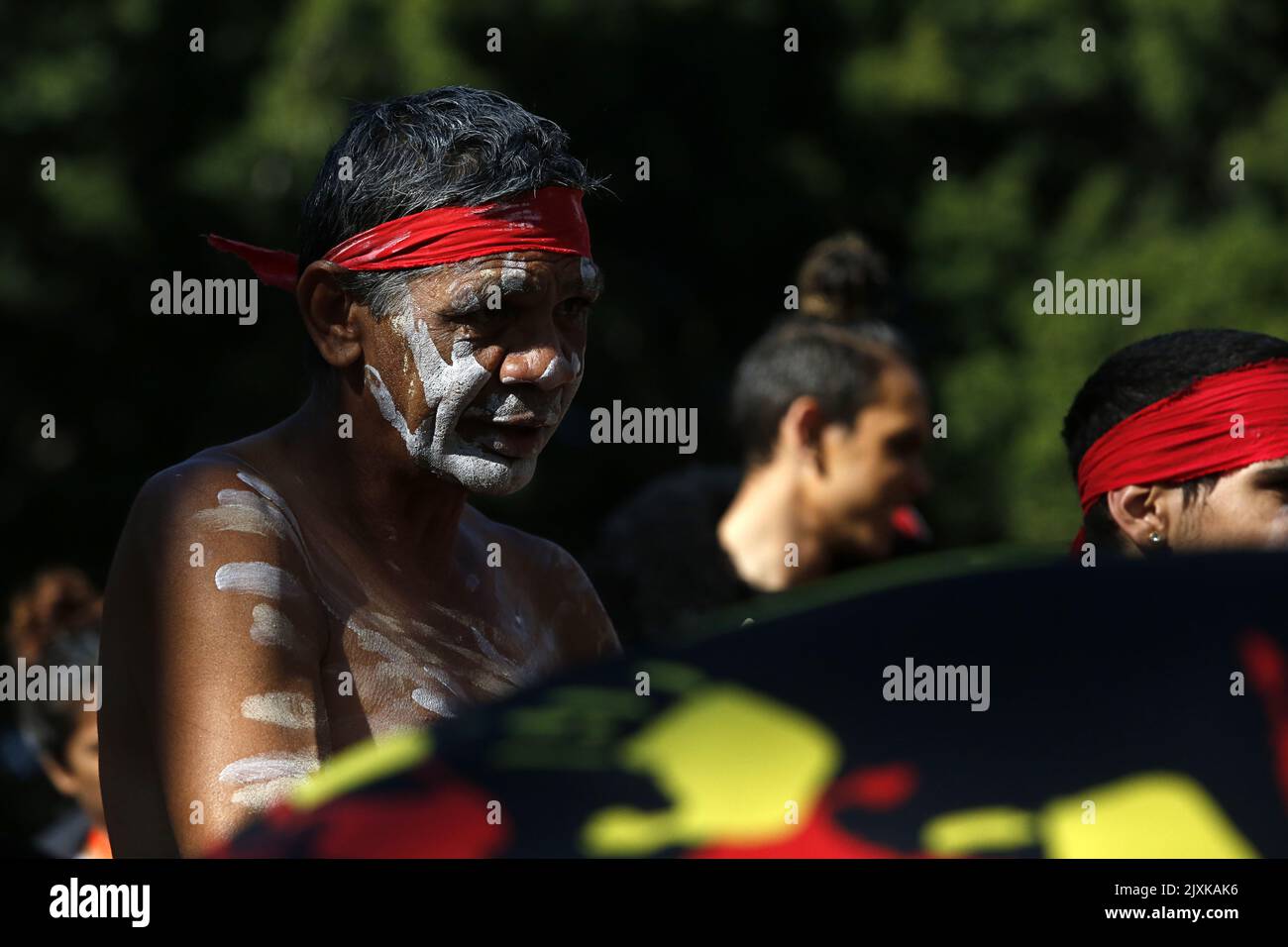 Indigenous dancers are seen during an Aboriginal land rights march ...